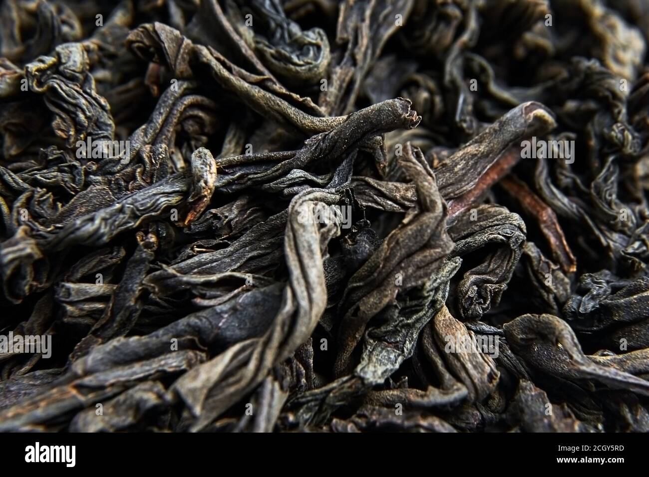 Black tea loose dried leaves. Background Stock Photo - Alamy