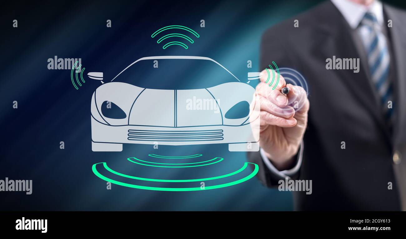 Man touching a smart car concept on a touch screen with a stylus pen ...