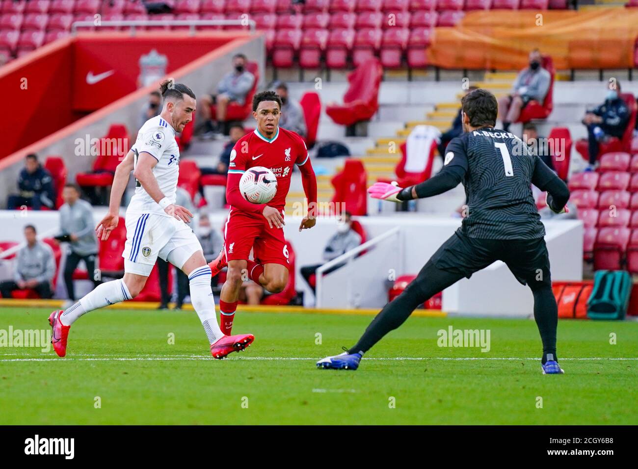 Leeds United forward Jack Harrison (22) lobs Liverpool goalkeeper ...