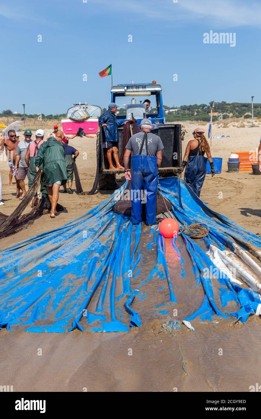 Costa da Caparica, Portugal - September 10, 2020: An artel of fishermen ...