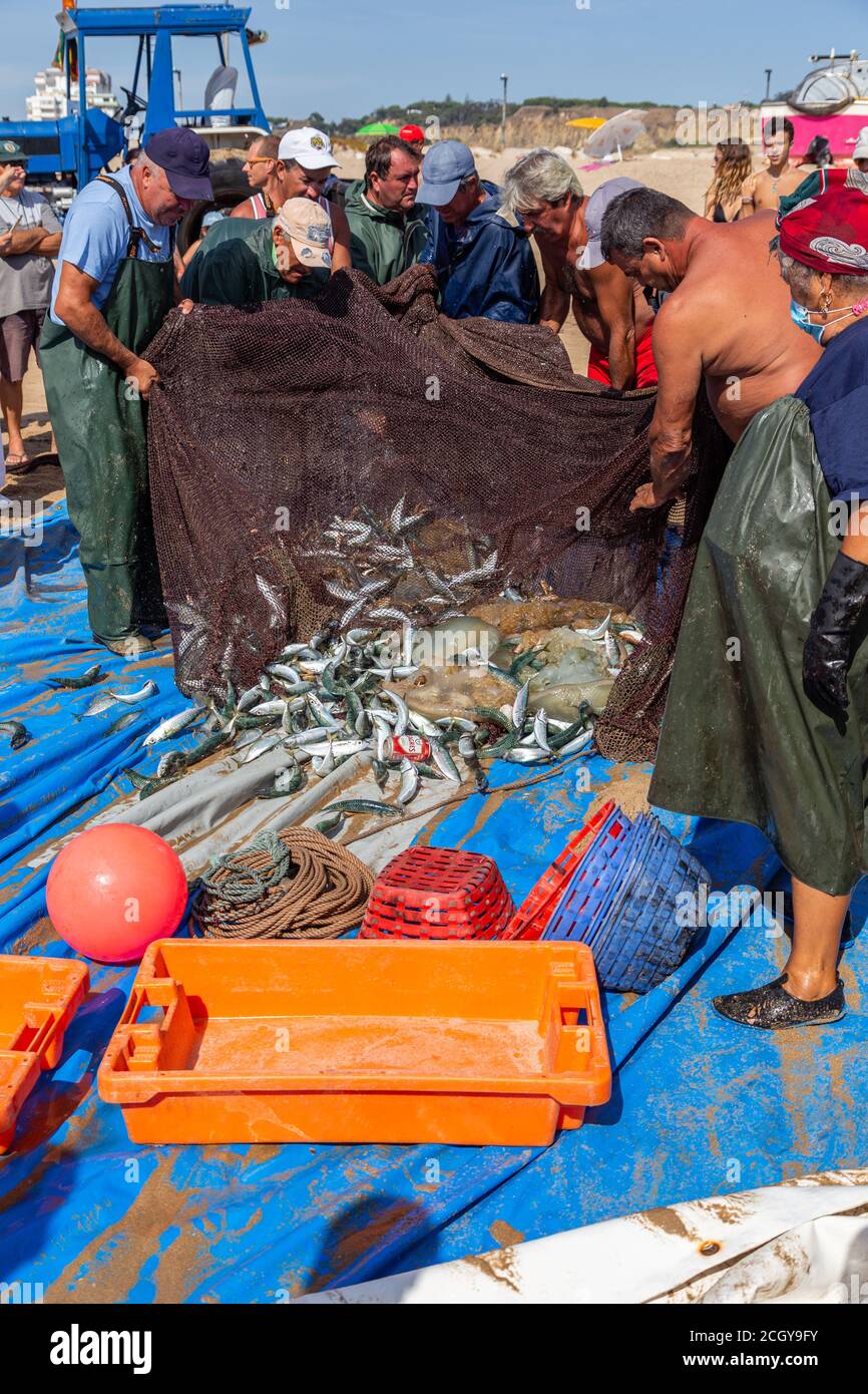 Costa da Caparica, Portugal - September 10, 2020: An artel of fishermen ...