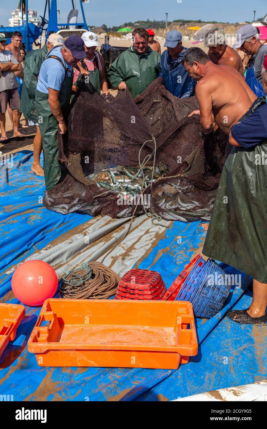 Costa da Caparica, Portugal - September 10, 2020: An artel of fishermen ...