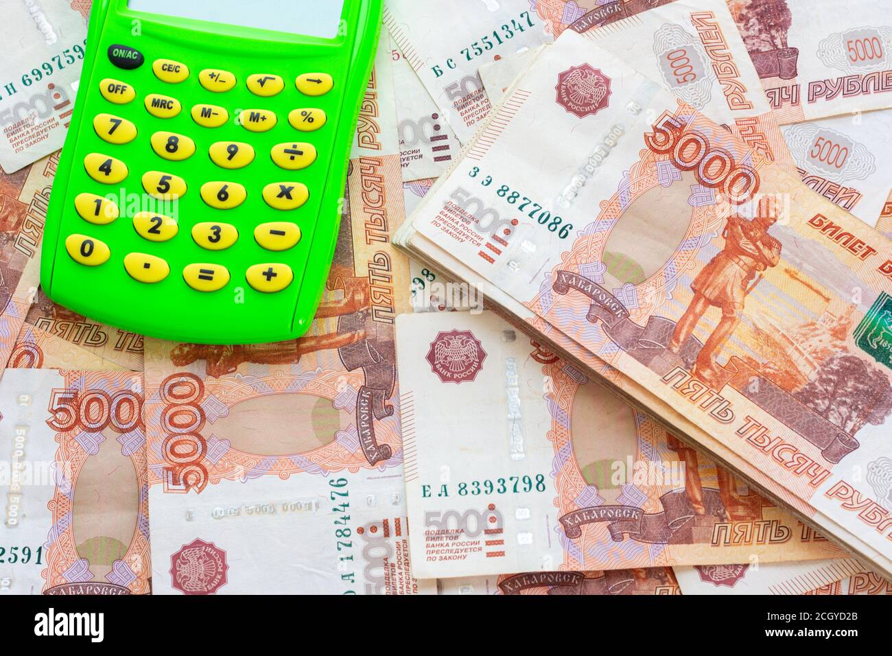 A pile of five thousandth Russian bills and a calculator Stock Photo ...