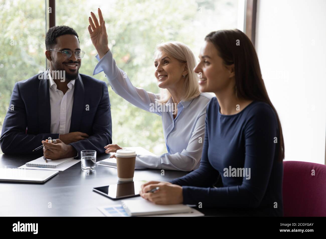 Employee raise hand ask hi-res stock photography and images - Alamy