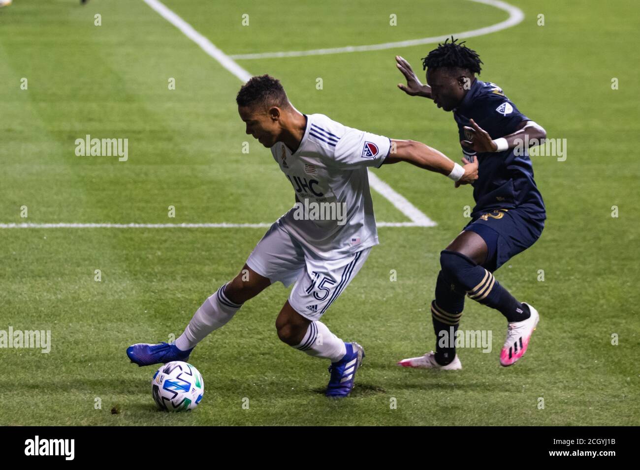 Brandon Bye shields Olivier Mbazio from the ball during the Major ...