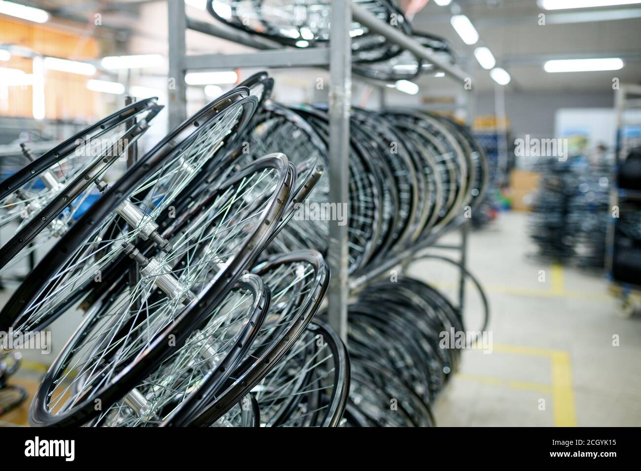 New bicycle wheels on professional assembly line Stock Photo - Alamy