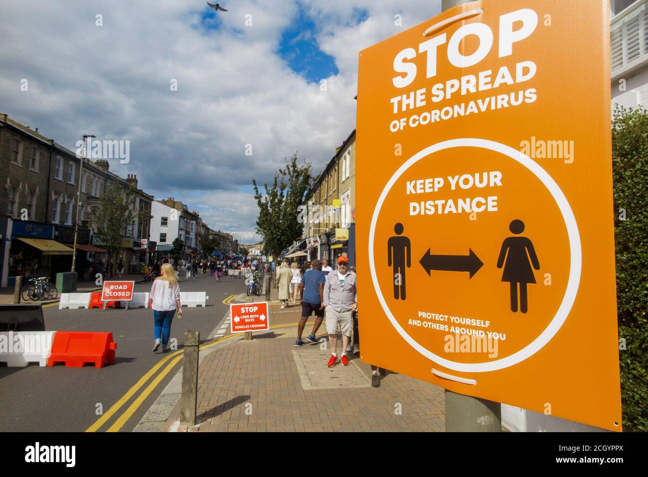 Keep Your Distance signs on Northcote Road, Clapham in London during ...