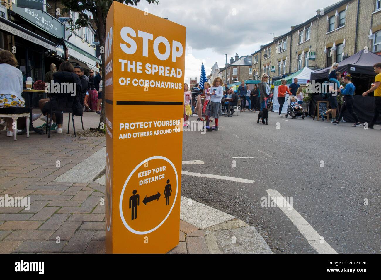 Keep Your Distance signs on Northcote Road, Clapham in London during ...