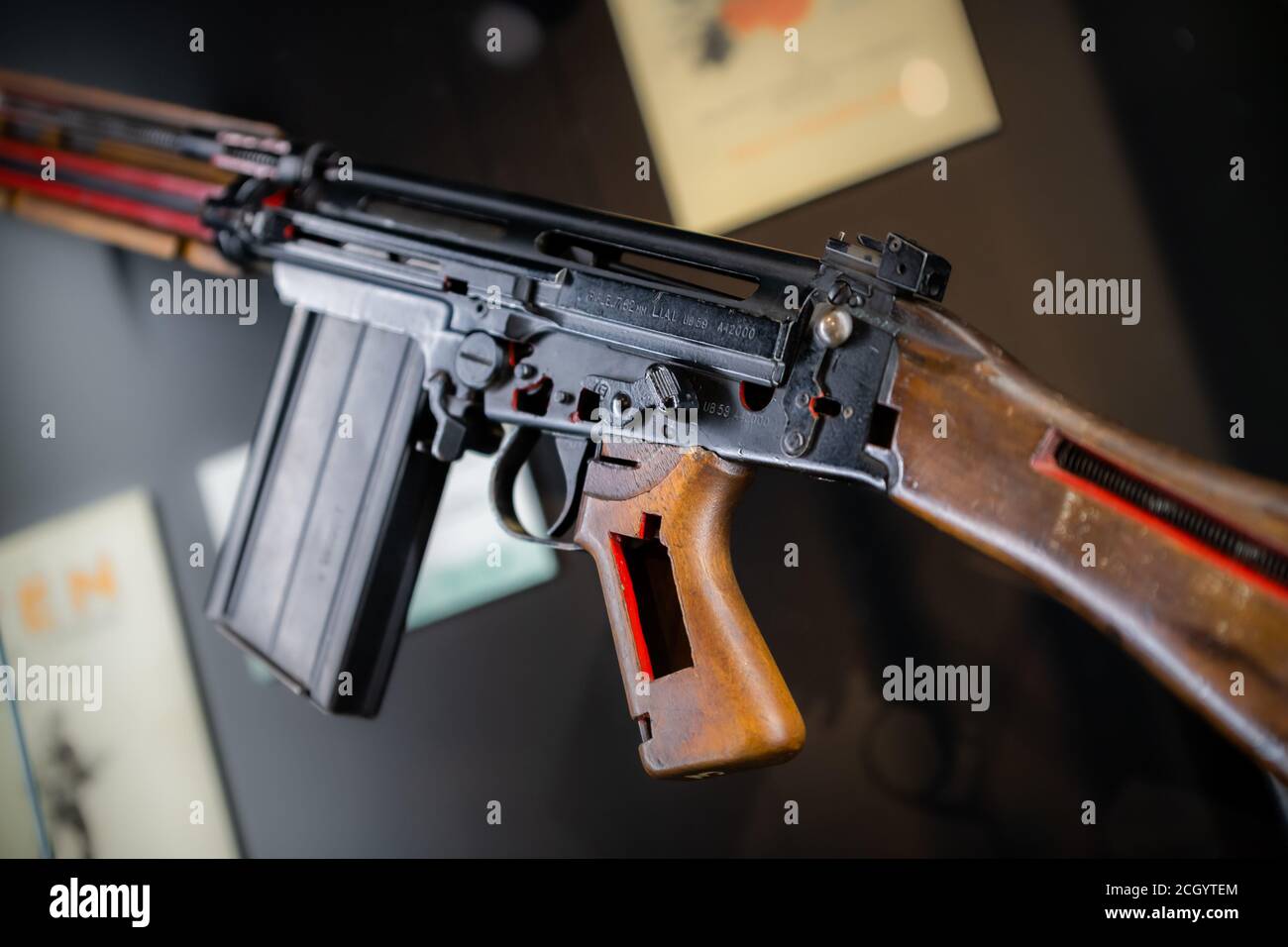 Close up of 7.62mm rifle. Black coloured, broken apart with the parts ...