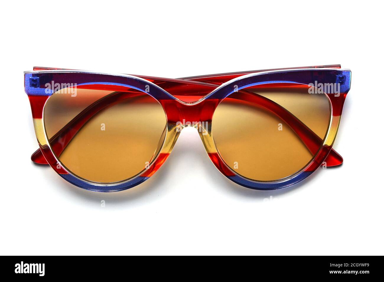 Sunglasses with yellow lens and red rim on white background Stock Photo ...