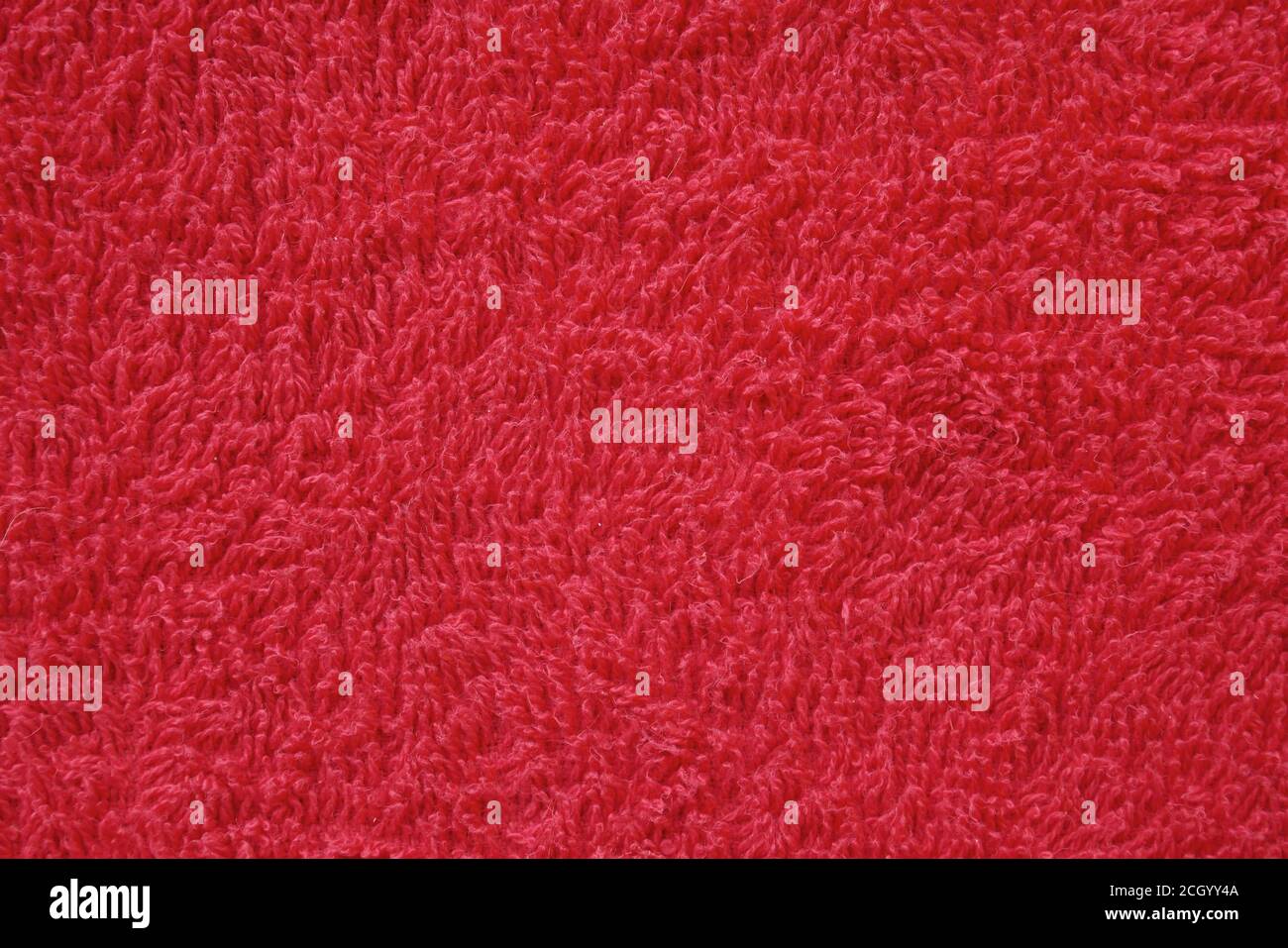 Red color soft textile fluffy towel texture material Stock Photo - Alamy