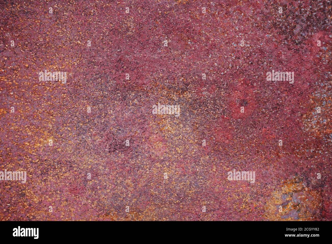 Old rusty vintage metal background red color. Empty metal surface copy ...