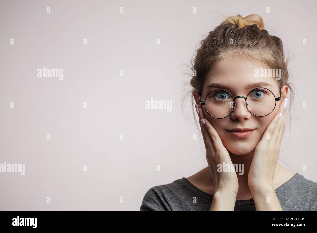 Close up portrait of shocked amazing young woman with bugged eyes in ...