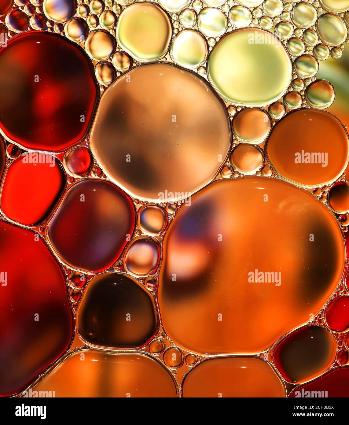 Abstract background with oil drops on water Stock Photo - Alamy