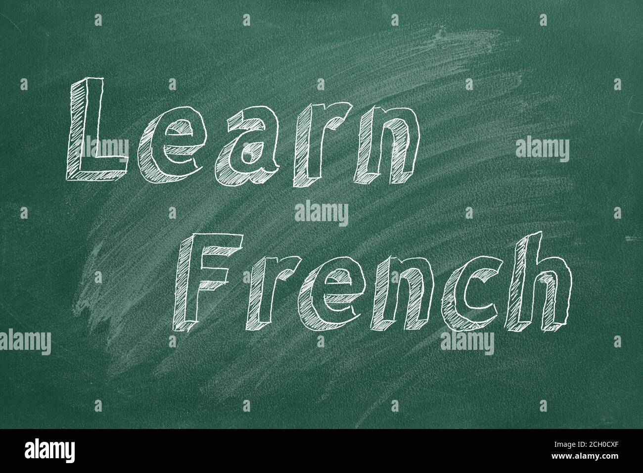 Hand drawing "Learn French" on green chalkboard Stock Photo - Alamy
