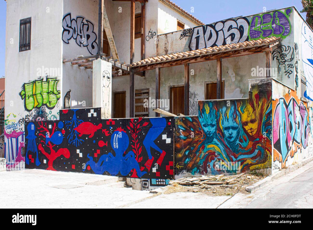 ATHENS, GREECE - AUGUST 13 2016: Ancient house in Athenswith drawings ...