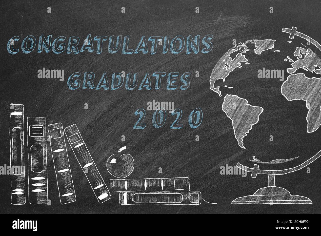 Lettering Congratulations graduates 2020, globe and school books are ...