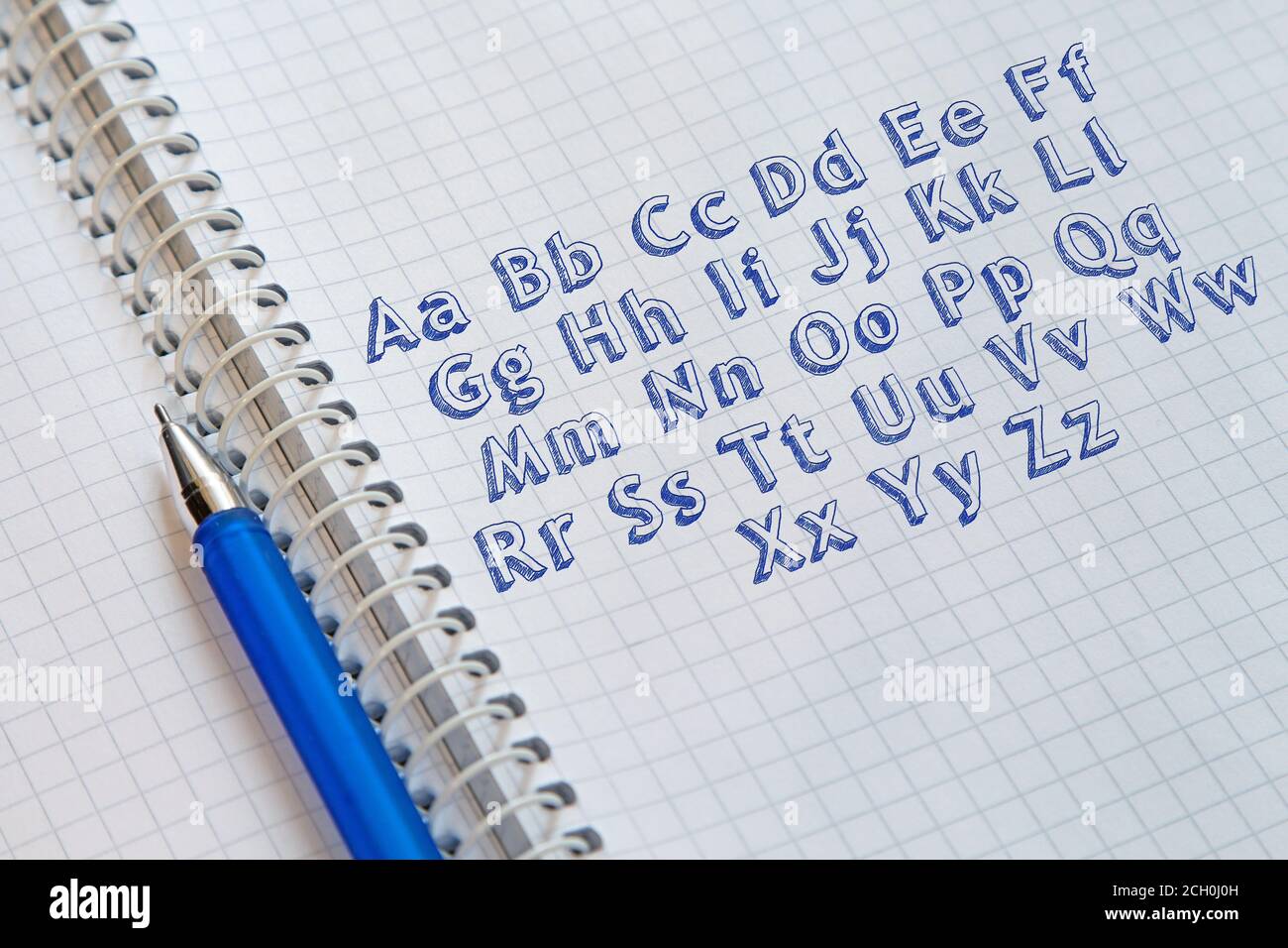 Handwritten alphabet on sheet of notebook Stock Photo - Alamy
