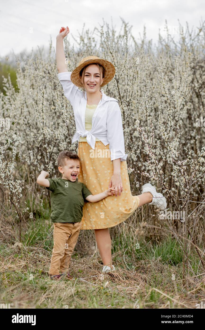 Happy Mother And Son Having Fun Together Mother Gently Hugs Her Son