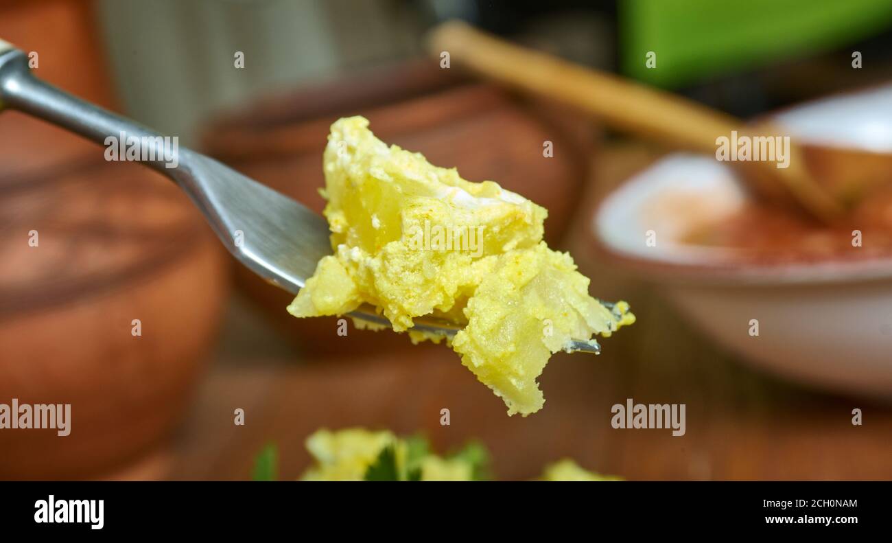 Denich Wot - Potato stew made in medium spicy curry and cumin sauce ...