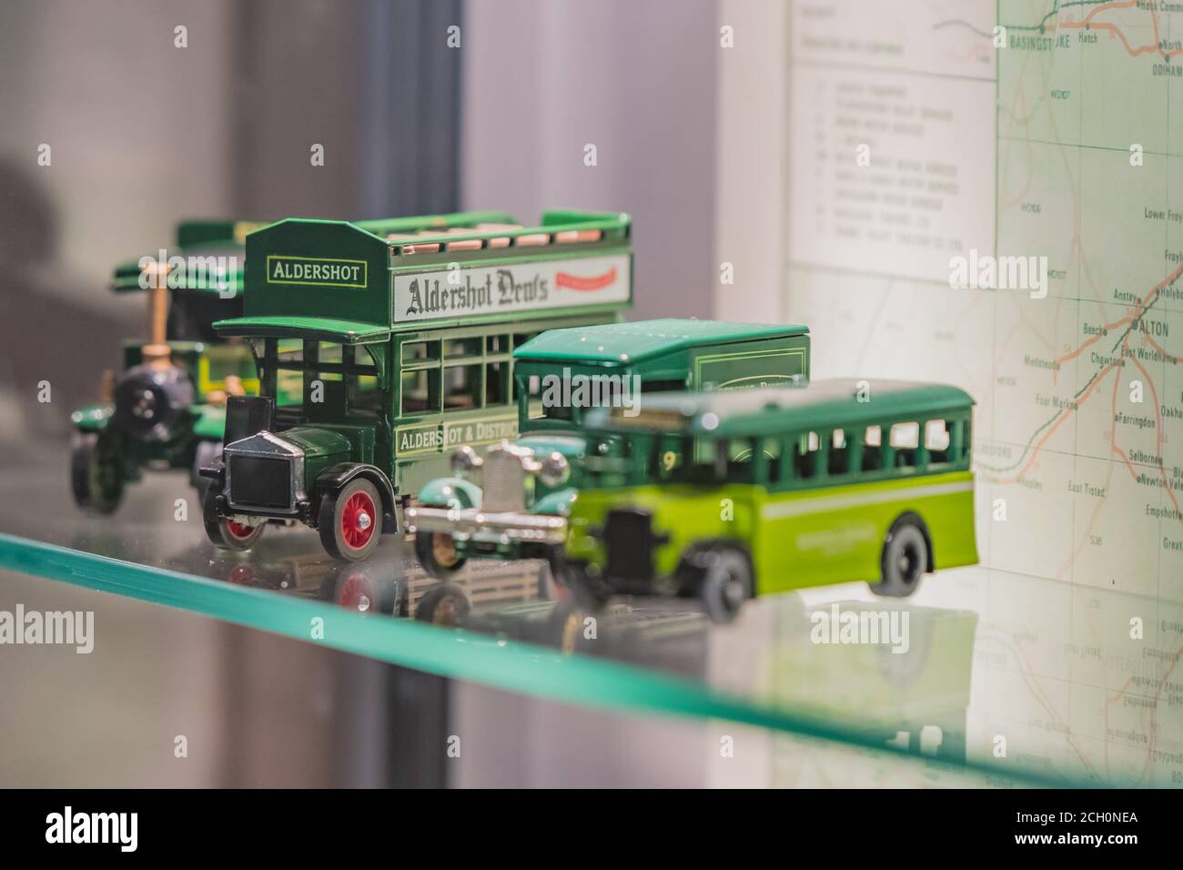 Old vintage model bus toys from Aldershot on display in a museum in ...