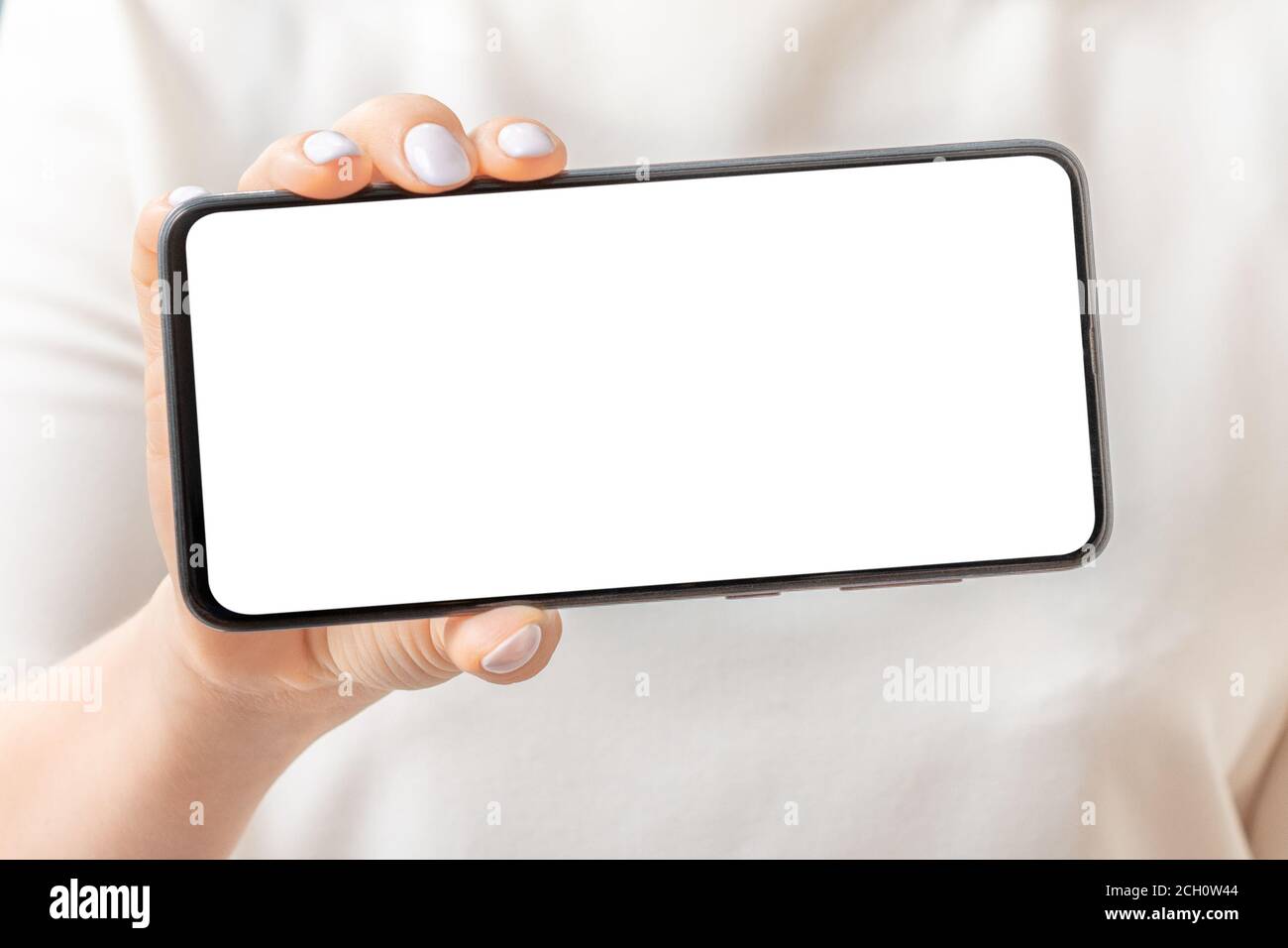 Women hold and show smartphones front view, Mockup image blank white ...