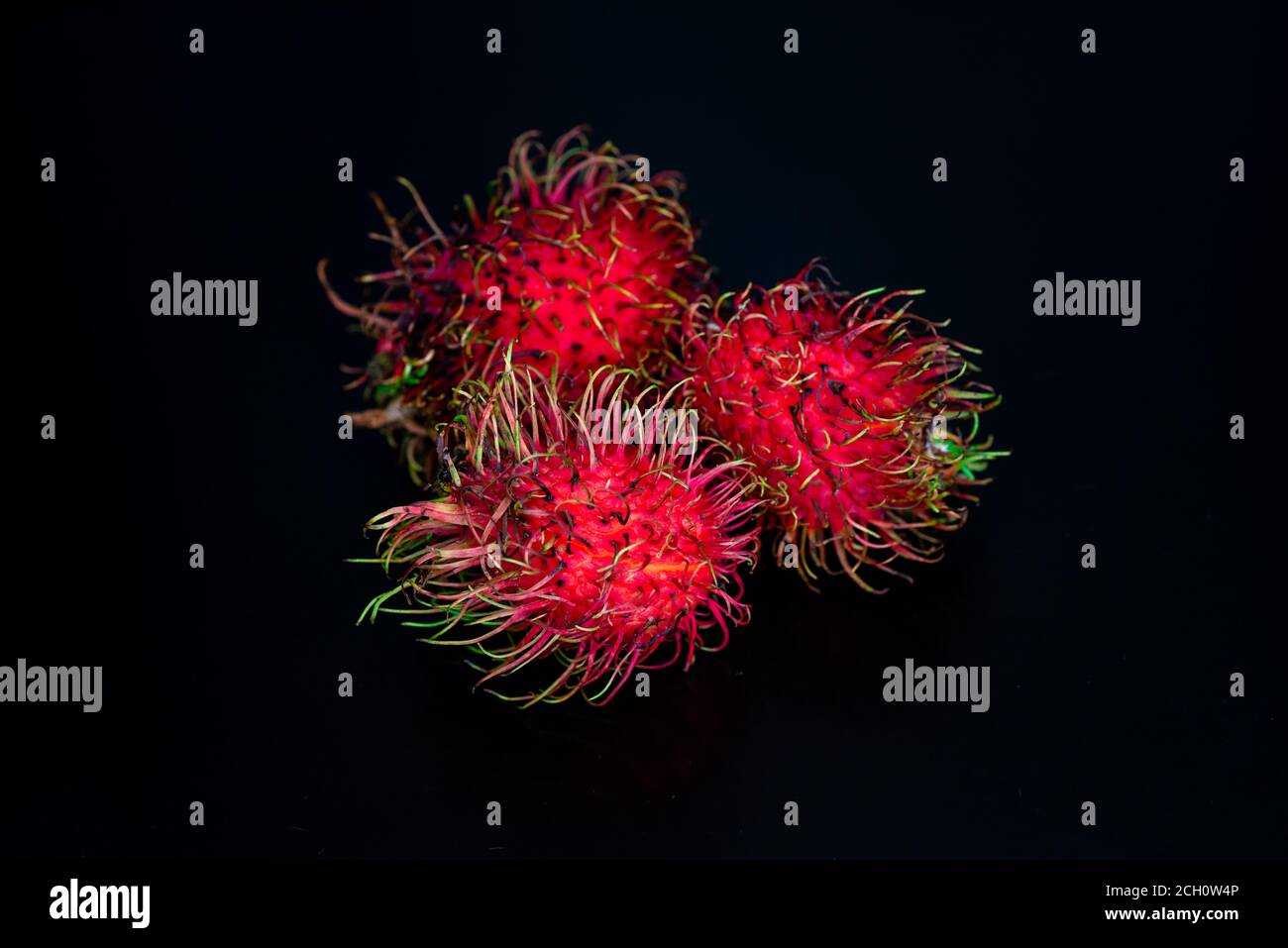 Hairy reddish fruit hi-res stock photography and images - Alamy