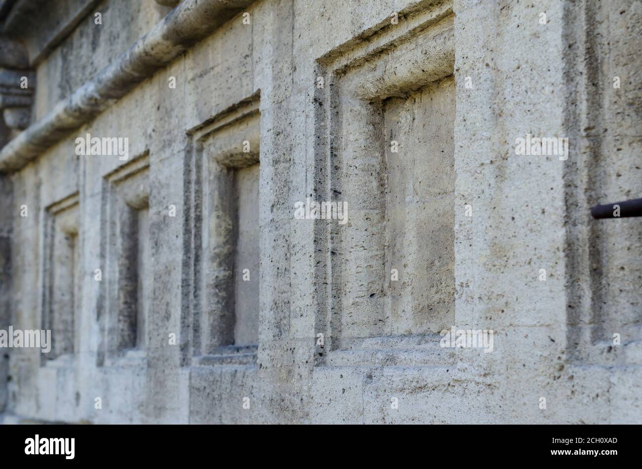 Fragment of the facade of an old building made of shell rock. Exterior ...