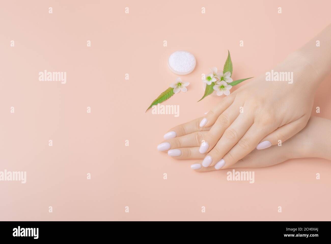Hands of middle aged woman with palms down. Mockup on desk background ...