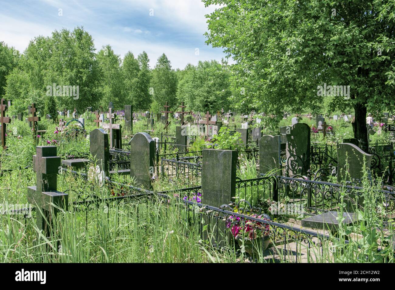 Orthodox Russian cemetery in the summer. crosses and tombstones ...