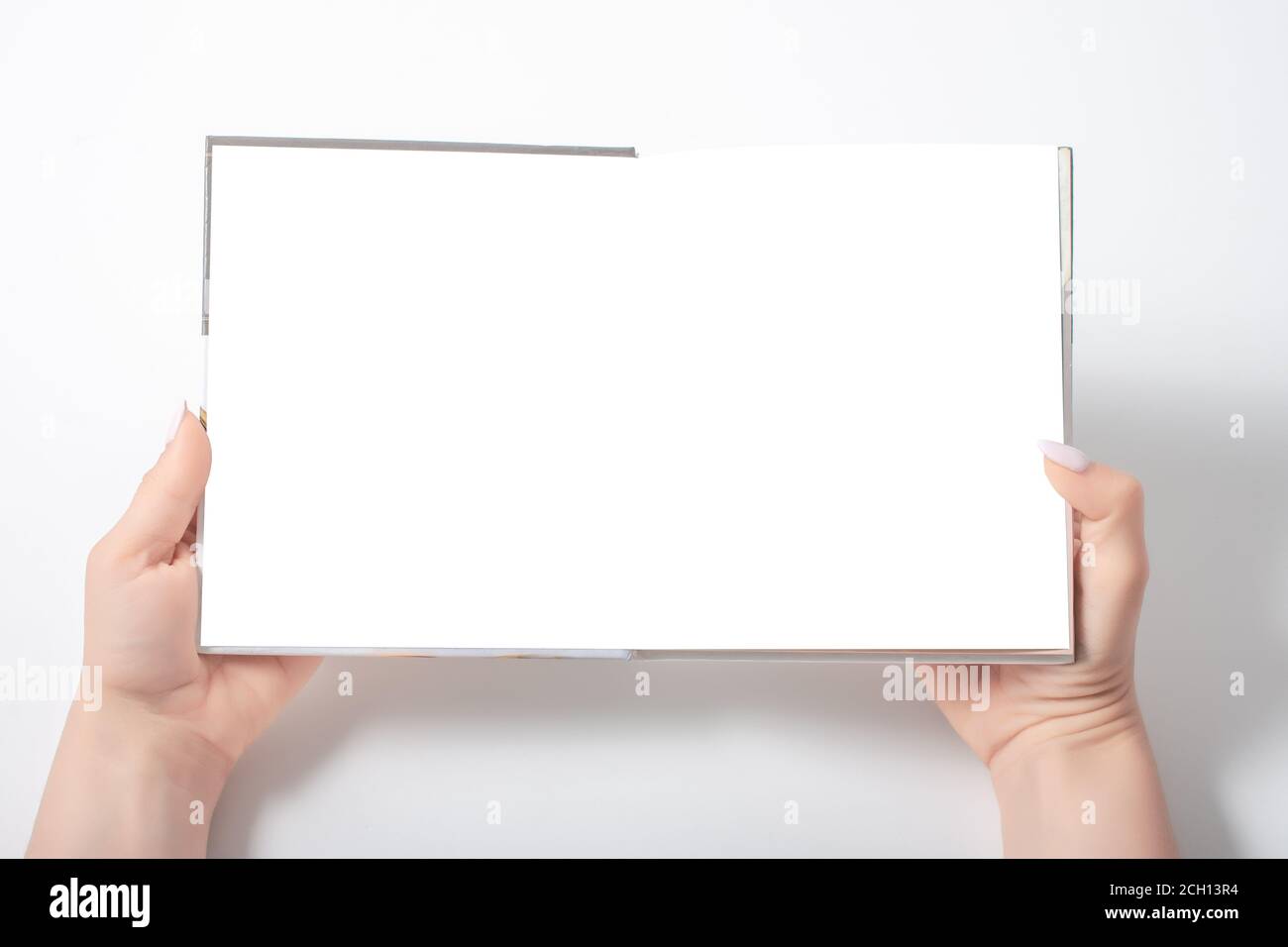 Female hands blank book hi-res stock photography and images - Alamy