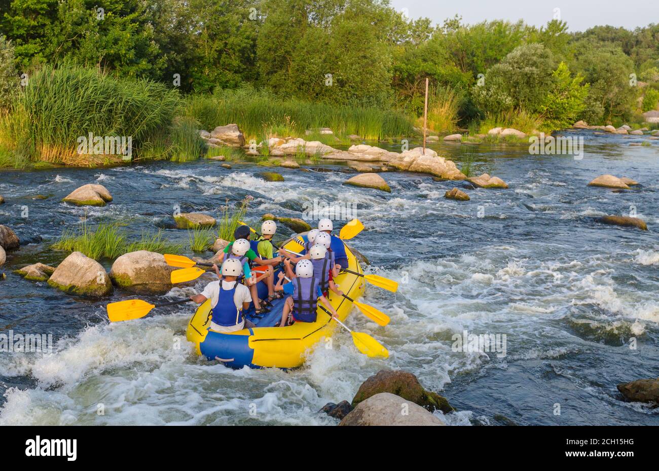 Rafting team , summer extreme water sport Stock Photo - Alamy
