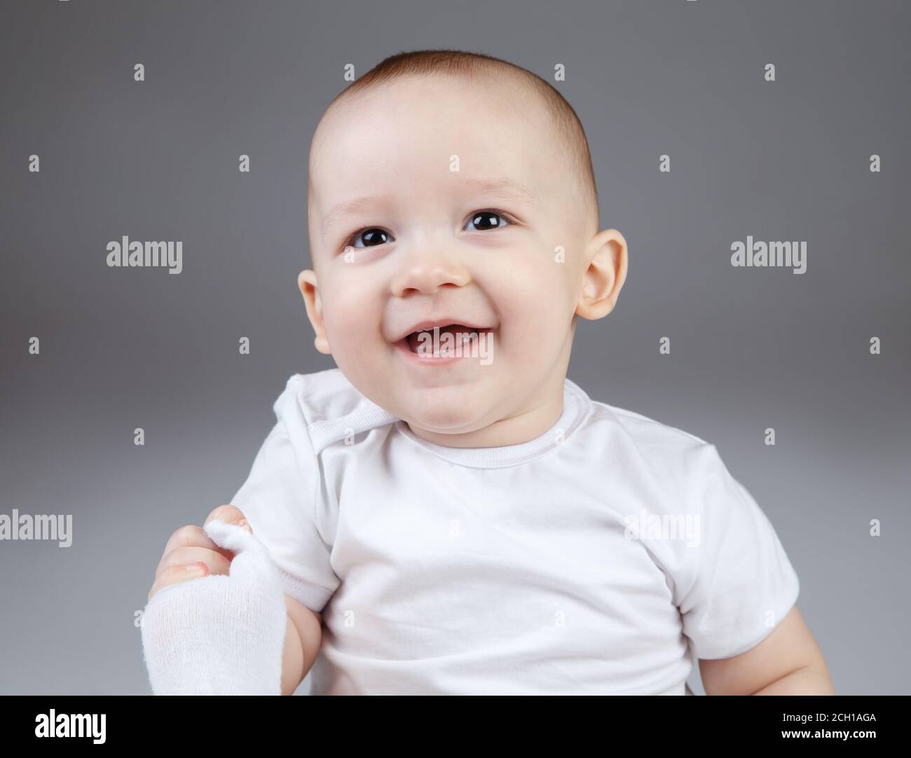 Portrait of a ten-month-old baby on a white background Stock Photo - Alamy