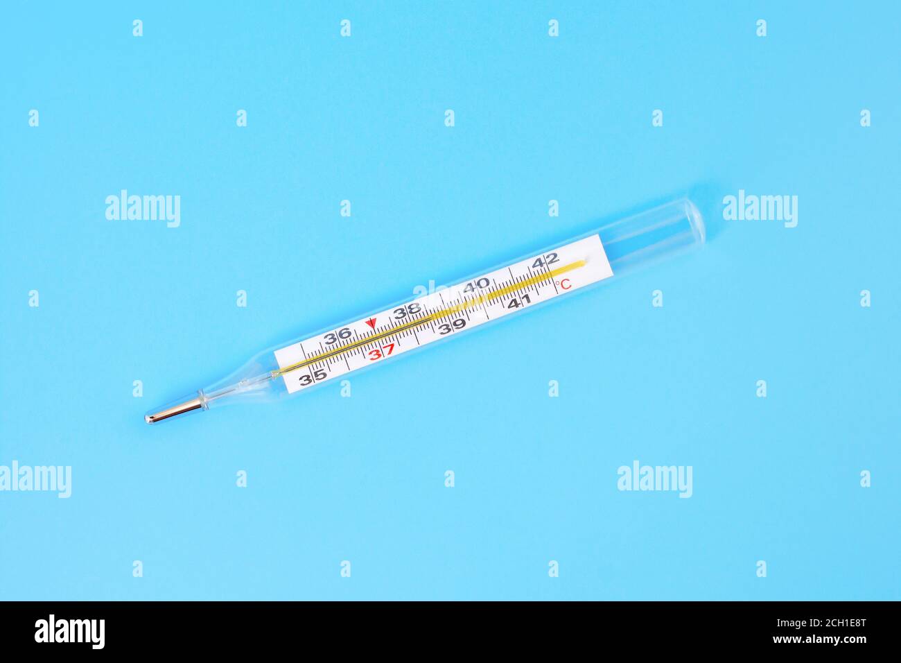 Medical mercury thermometer isolated on blue. Accurate medical ...