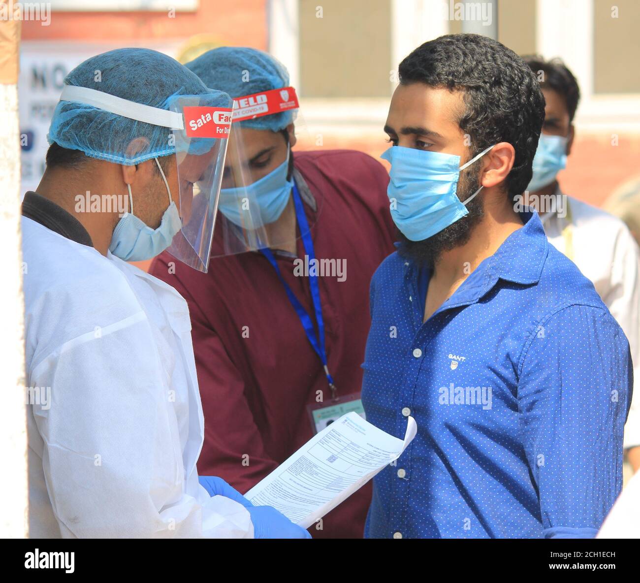 Srinagar, India. 13th Sep, 2020. A medical team officer checking the ...
