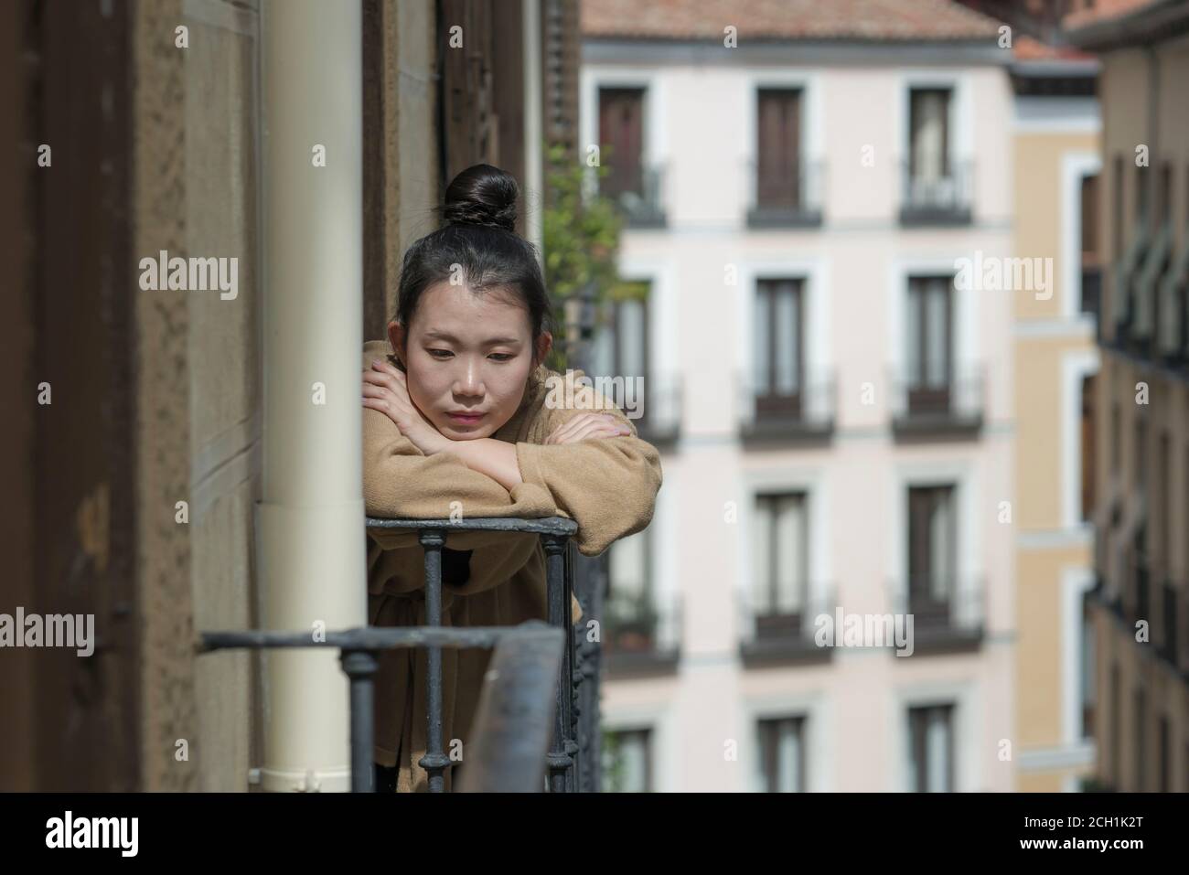 dramatic portrait of young beautiful sad and depressed Asian Chinese ...