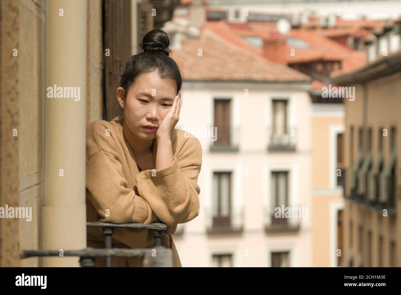 dramatic portrait of young beautiful sad and depressed Asian Japanese ...