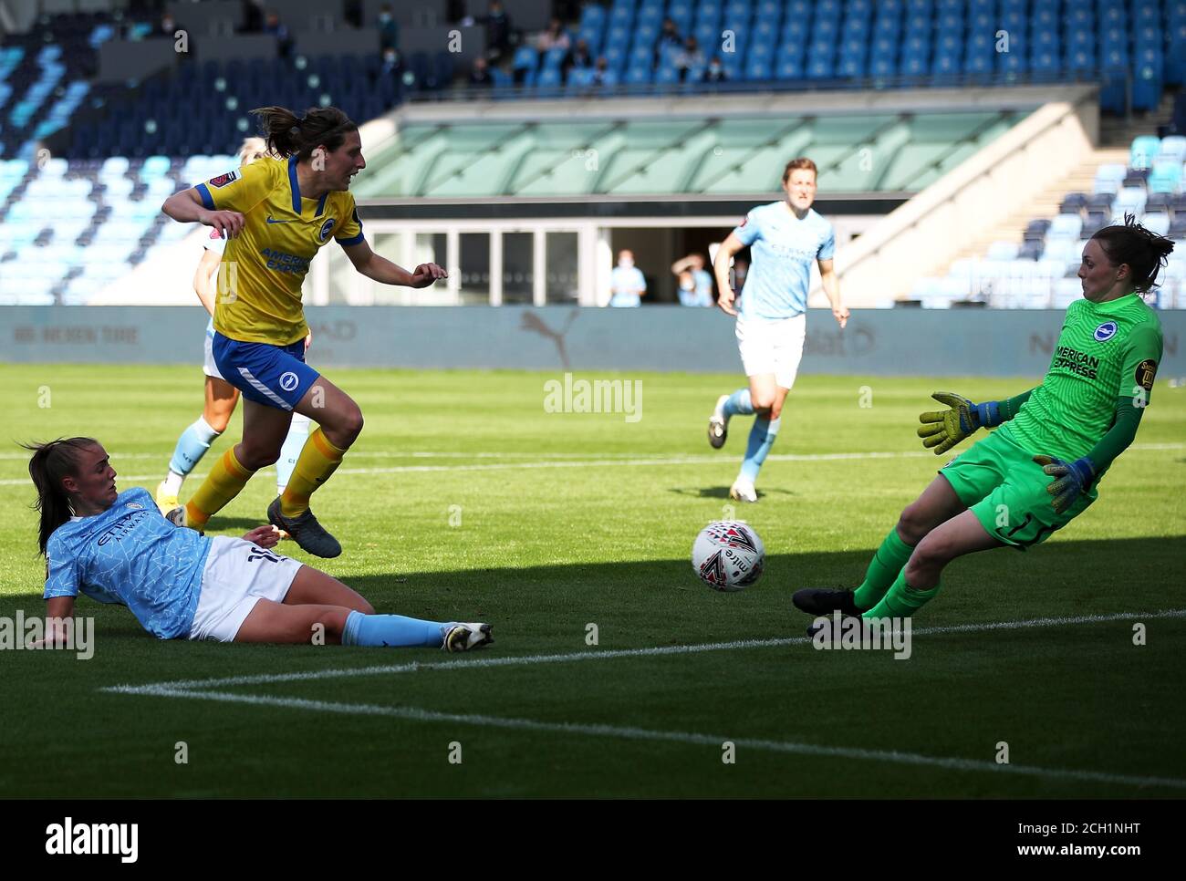 Manchester City's Georgia Stanway (left) shoots towards goal but is ...