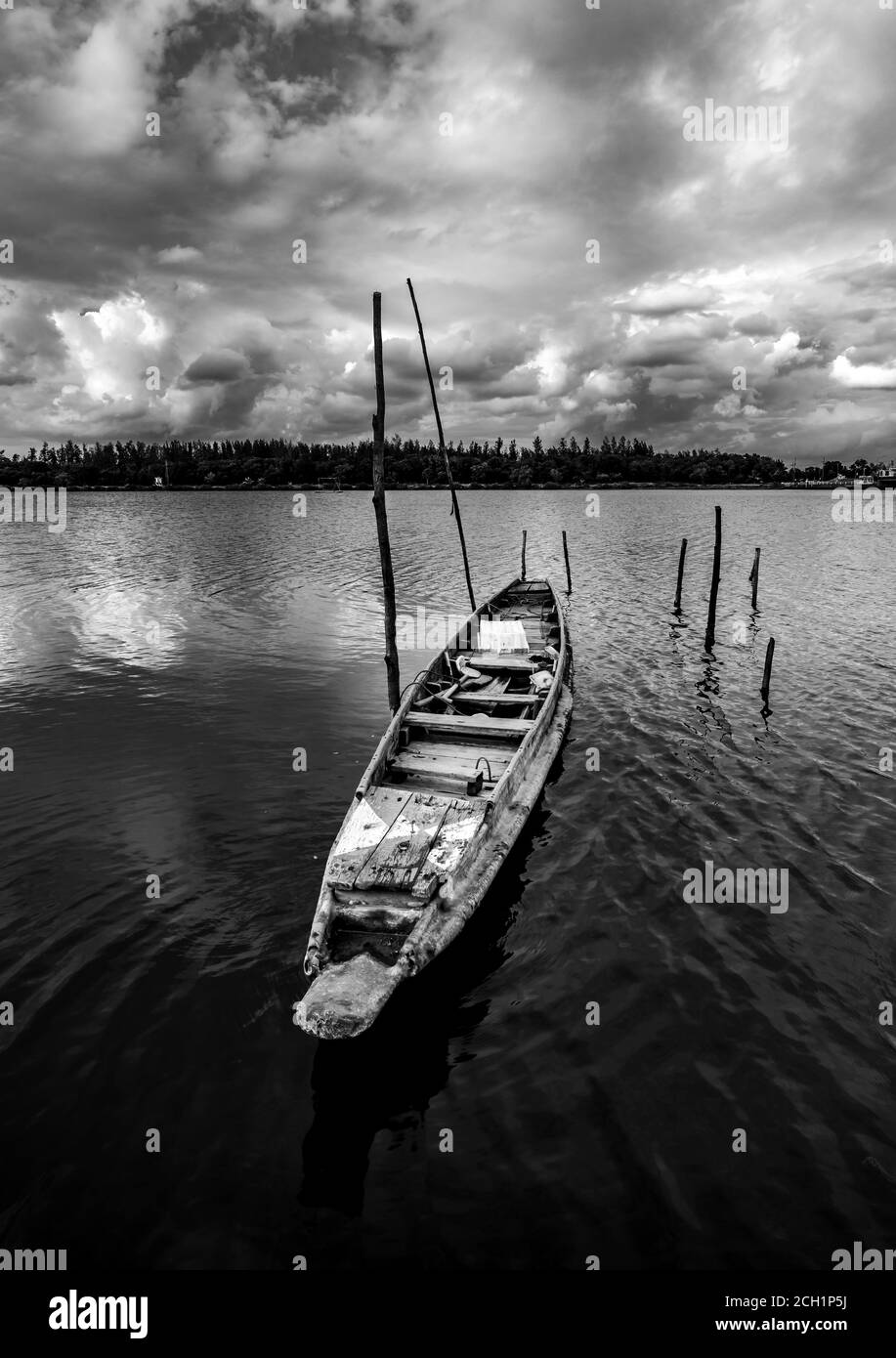 Fishing boat with view of landscape nature in sky and cloud storm and ...