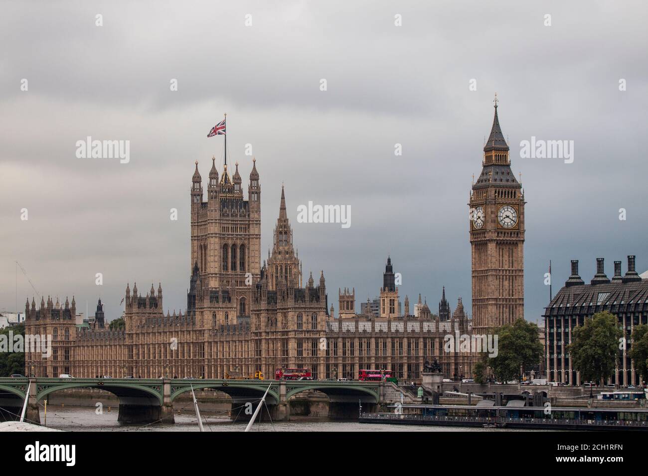 Tower bridge with red double decker bus in the daytime hi-res stock ...