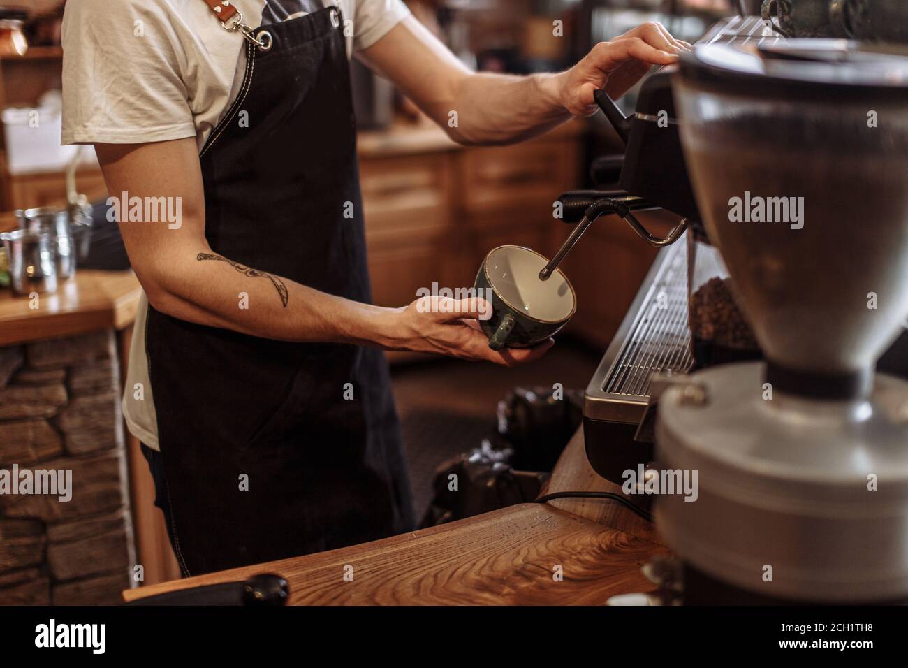 Hand pouring coffee beans from hi-res stock photography and images - Alamy