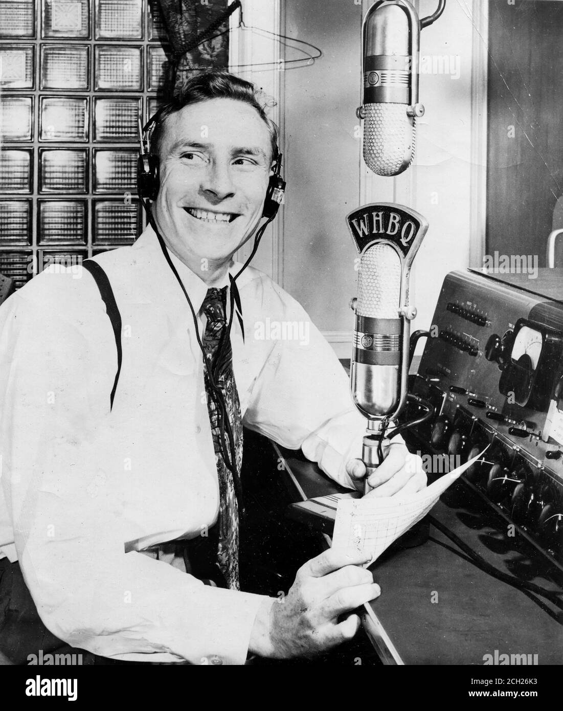 Radio DJ Dewey Phillips sits at the control board at WHBQ Stock Photo ...