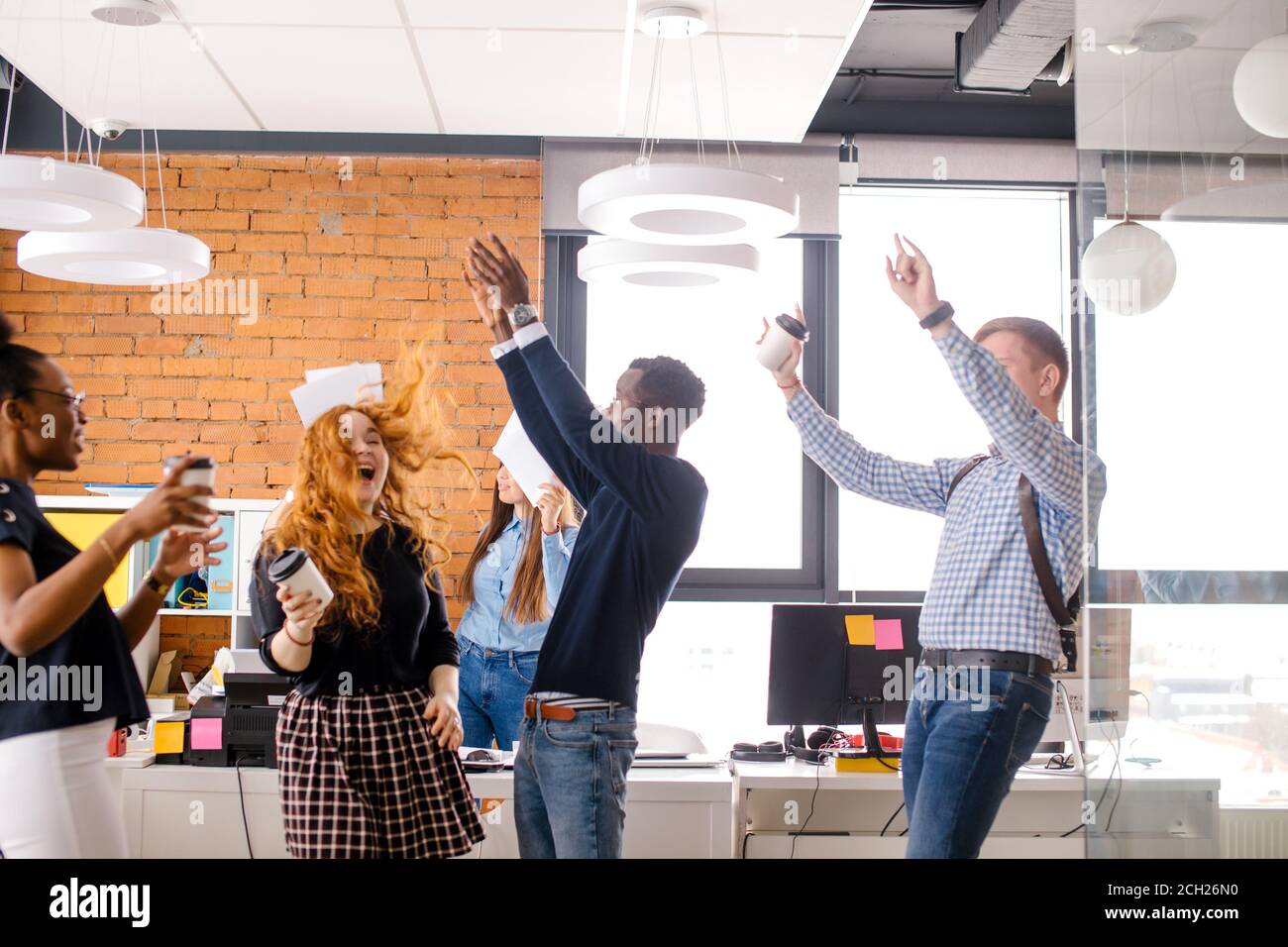 co-workers are celebrating successful contract of the firm.good deal ...