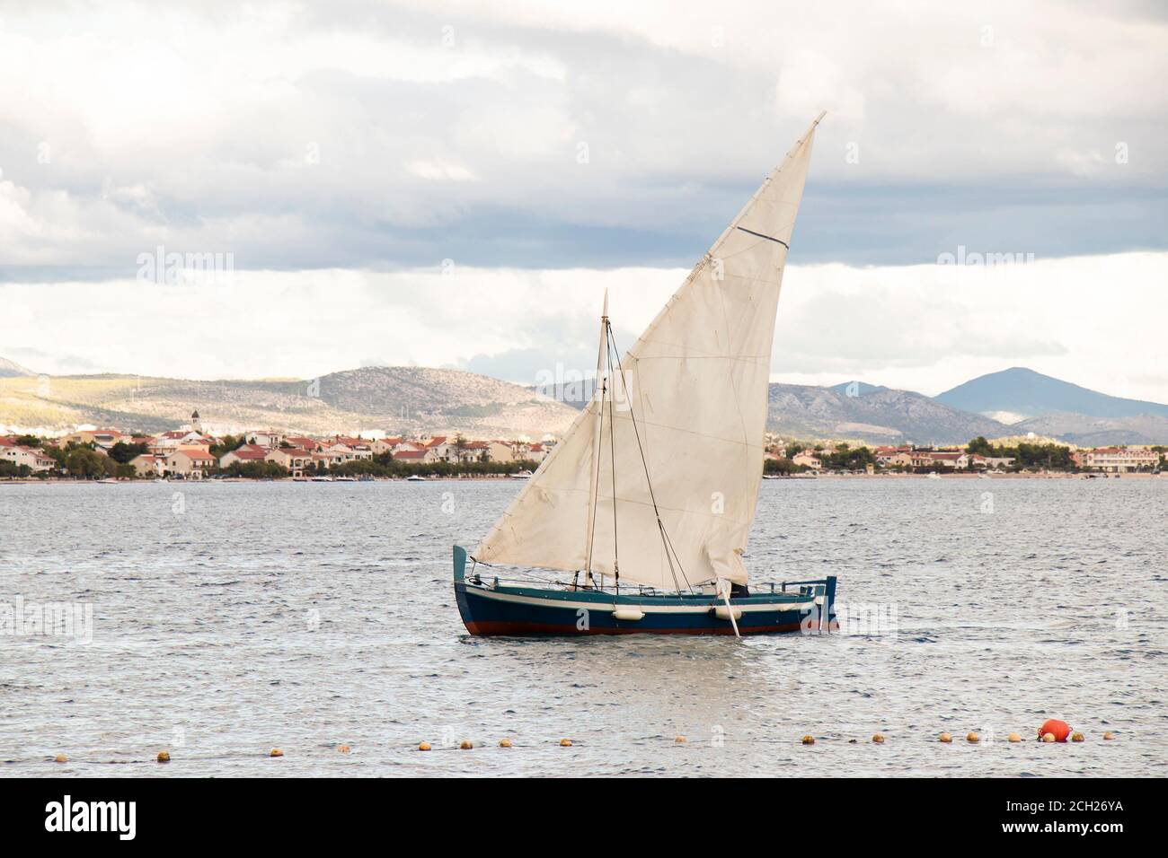 Distant sail boat hi-res stock photography and images - Alamy
