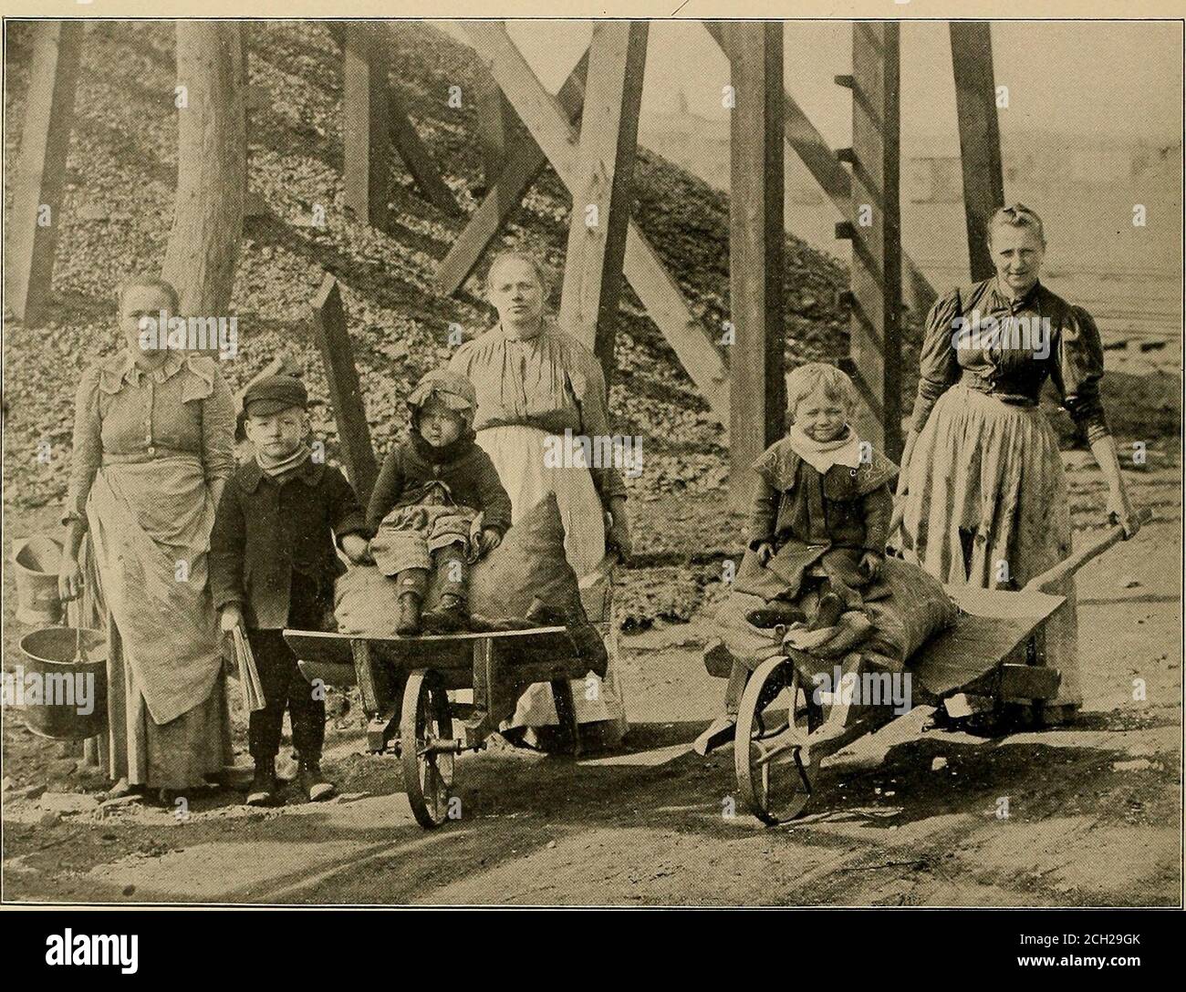 . The "Switzerland of America" . A MINERS LUNCH. WOMEN TAKING HOME COAL ...