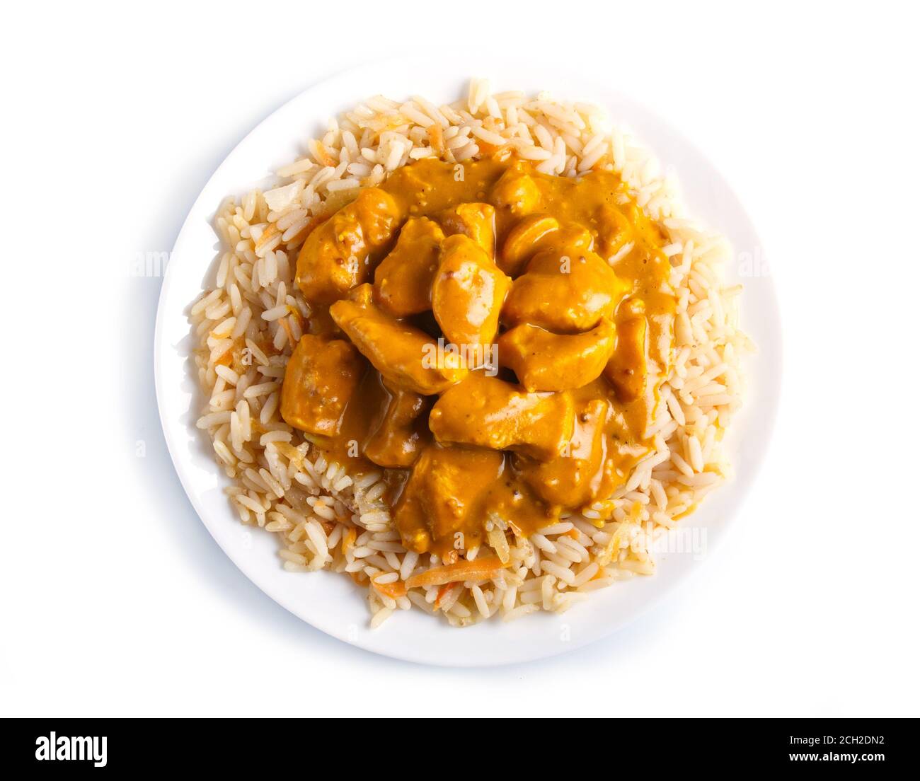 Rice with chicken curry sauce with cashew isolated on white background ...
