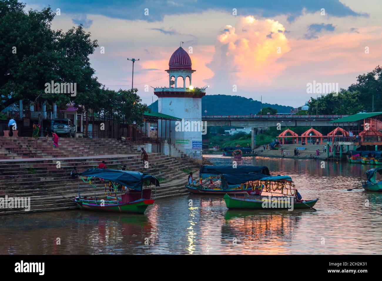 Chitrakoot, Madhya Pradesh, India : Boats are moored at sunset on the ...