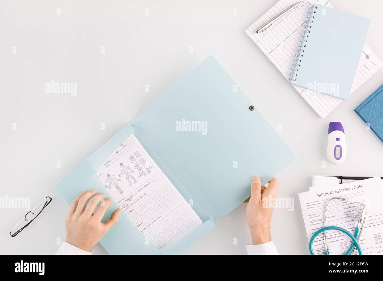 Doctor writing chart report hi-res stock photography and images - Alamy