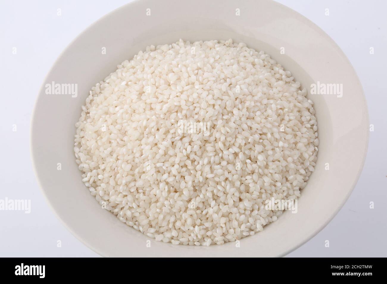 raw white rice dish ready for cook Stock Photo - Alamy