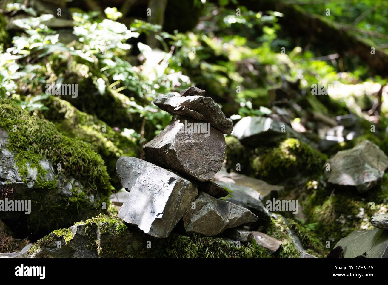 A stack of stones stands on top of each other. Mysterious ritual ...